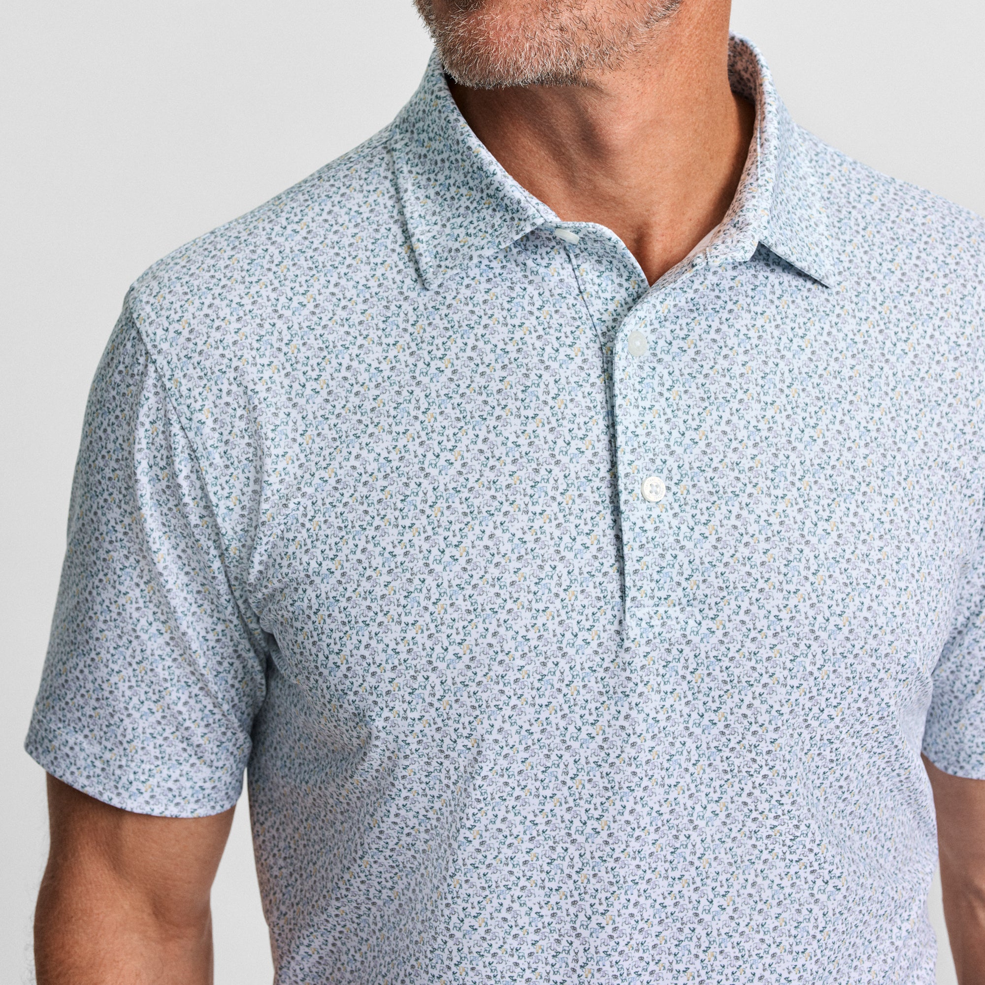 Sweatered Stag Printed Performance Polo | GenTeal Men's Apparel